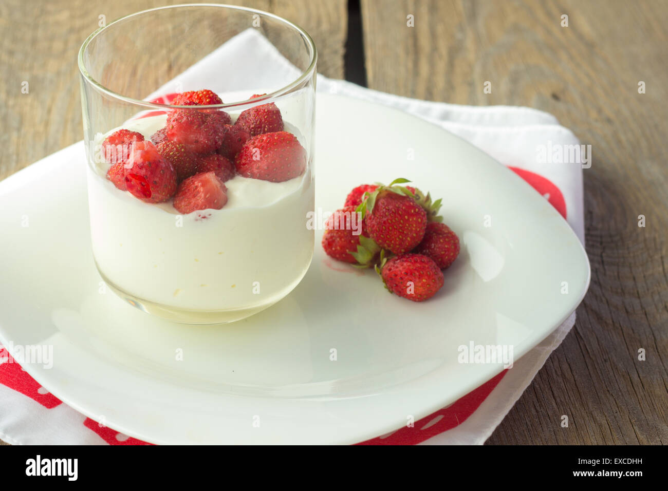 Cream pudding with strawberry in glass horizontal selective focus Stock ...