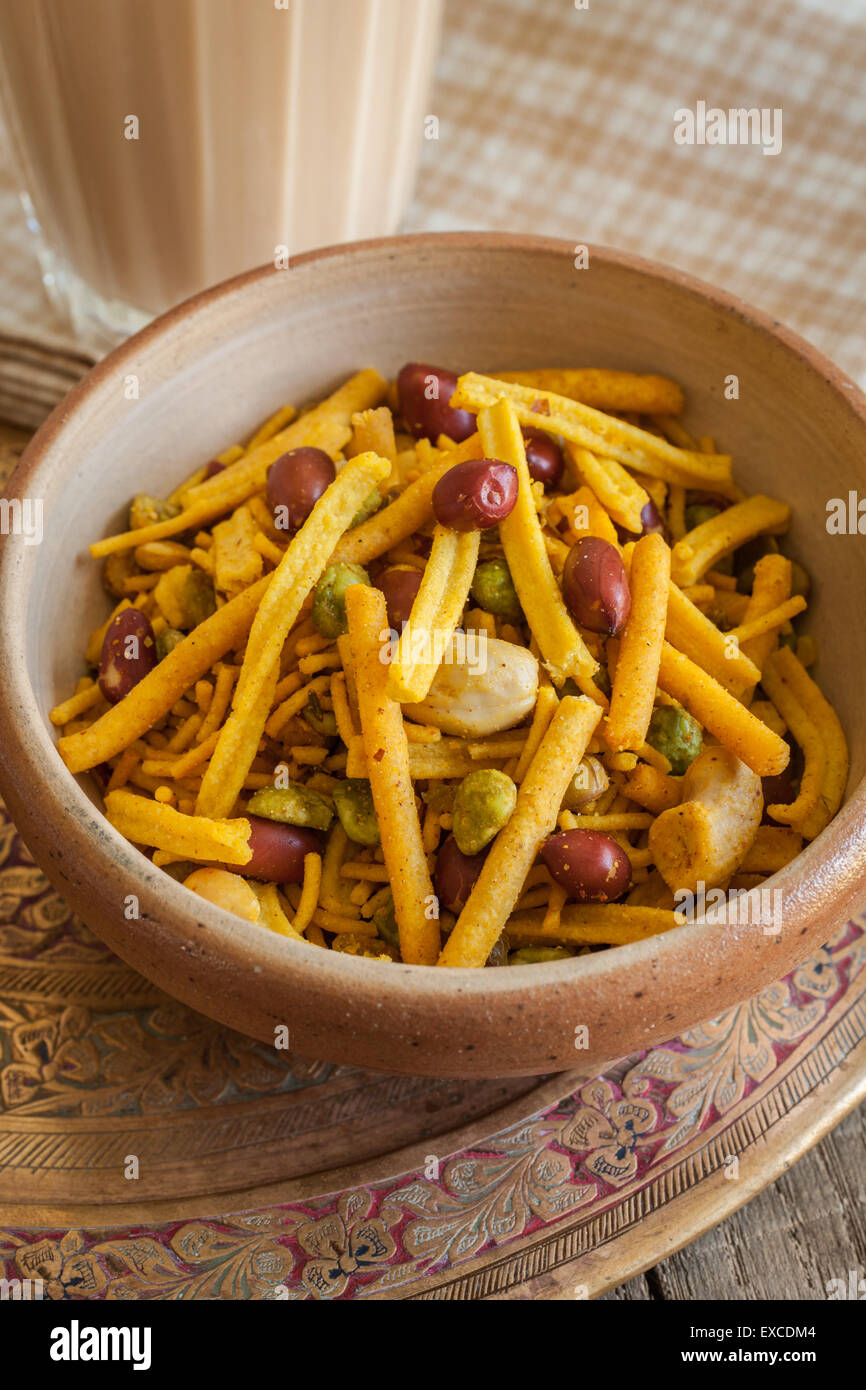 Chiwda or Bombay mix a spicy Indian snack of noodles nuts and peas ...