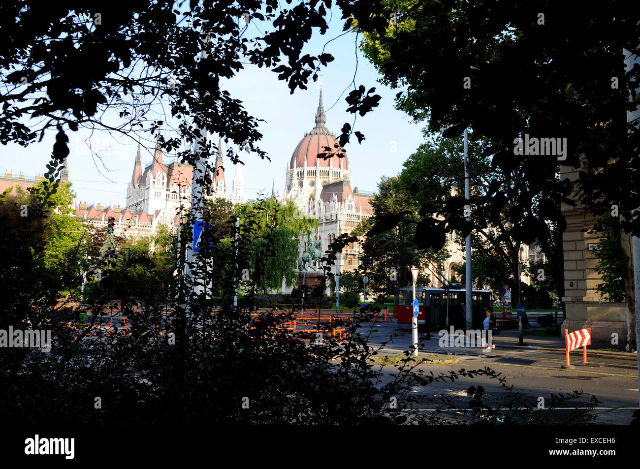 The Hungarian Parliament Building seen through the trees Stock Photo ...