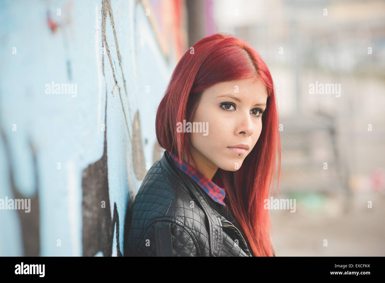 young beautiful red hair venezuelan woman lifestyle in the city of ...