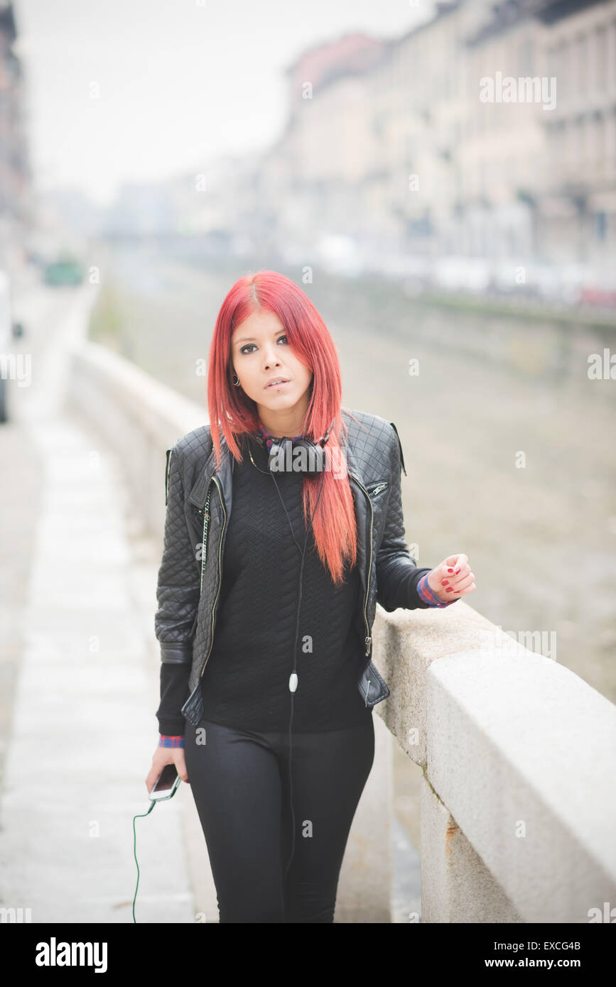 young beautiful red hair venezuelan woman lifestyle in the city of ...