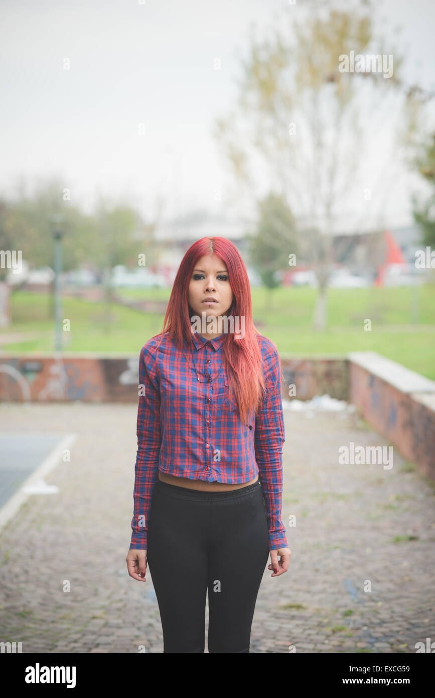 young beautiful red hair venezuelan woman lifestyle in the city of ...
