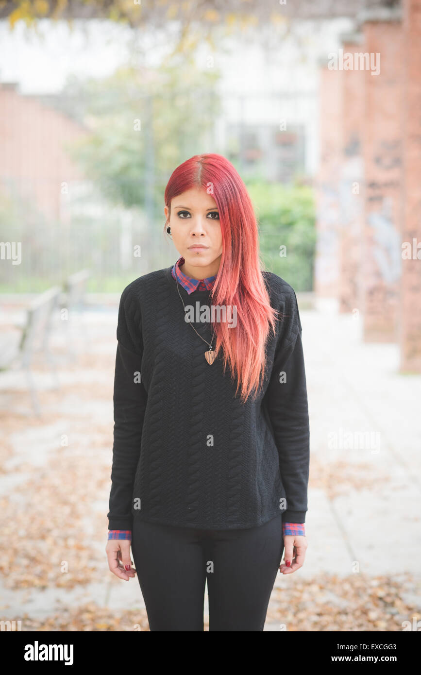 young beautiful red hair venezuelan woman lifestyle in the city of ...