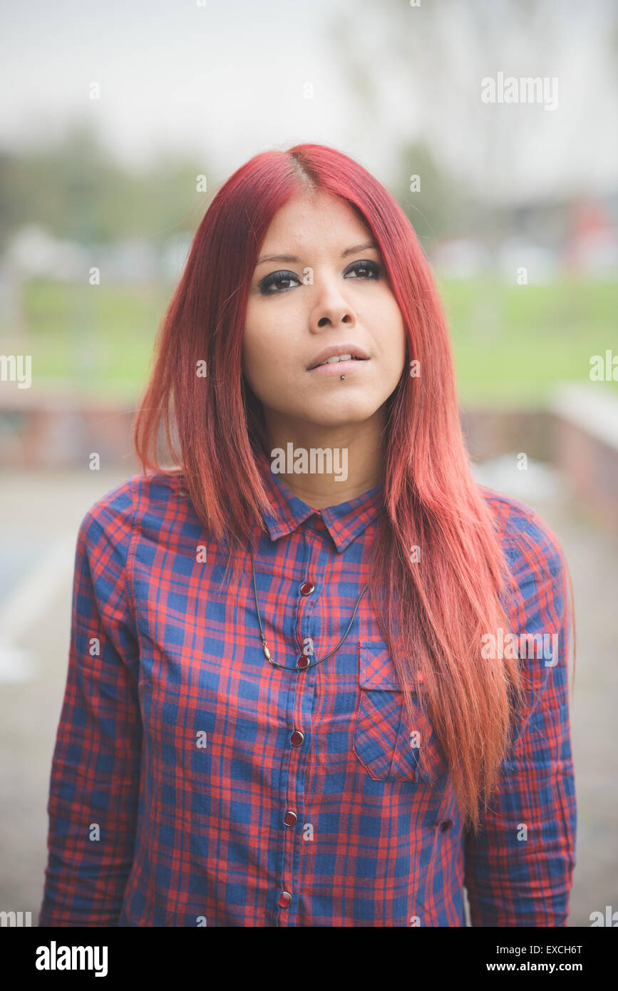 young beautiful red hair venezuelan woman lifestyle in the city of ...