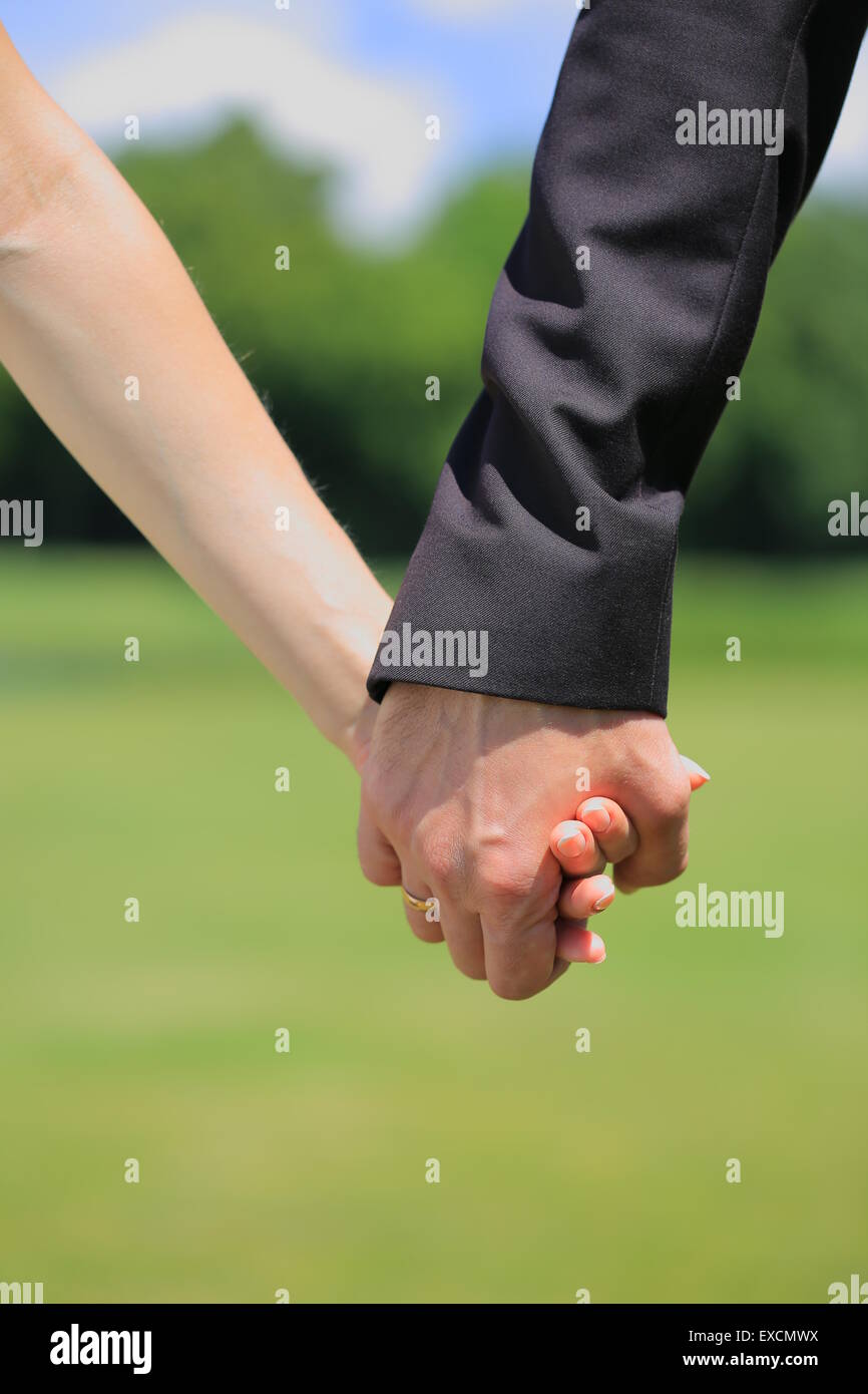 Couple hands hi-res stock photography and images - Alamy