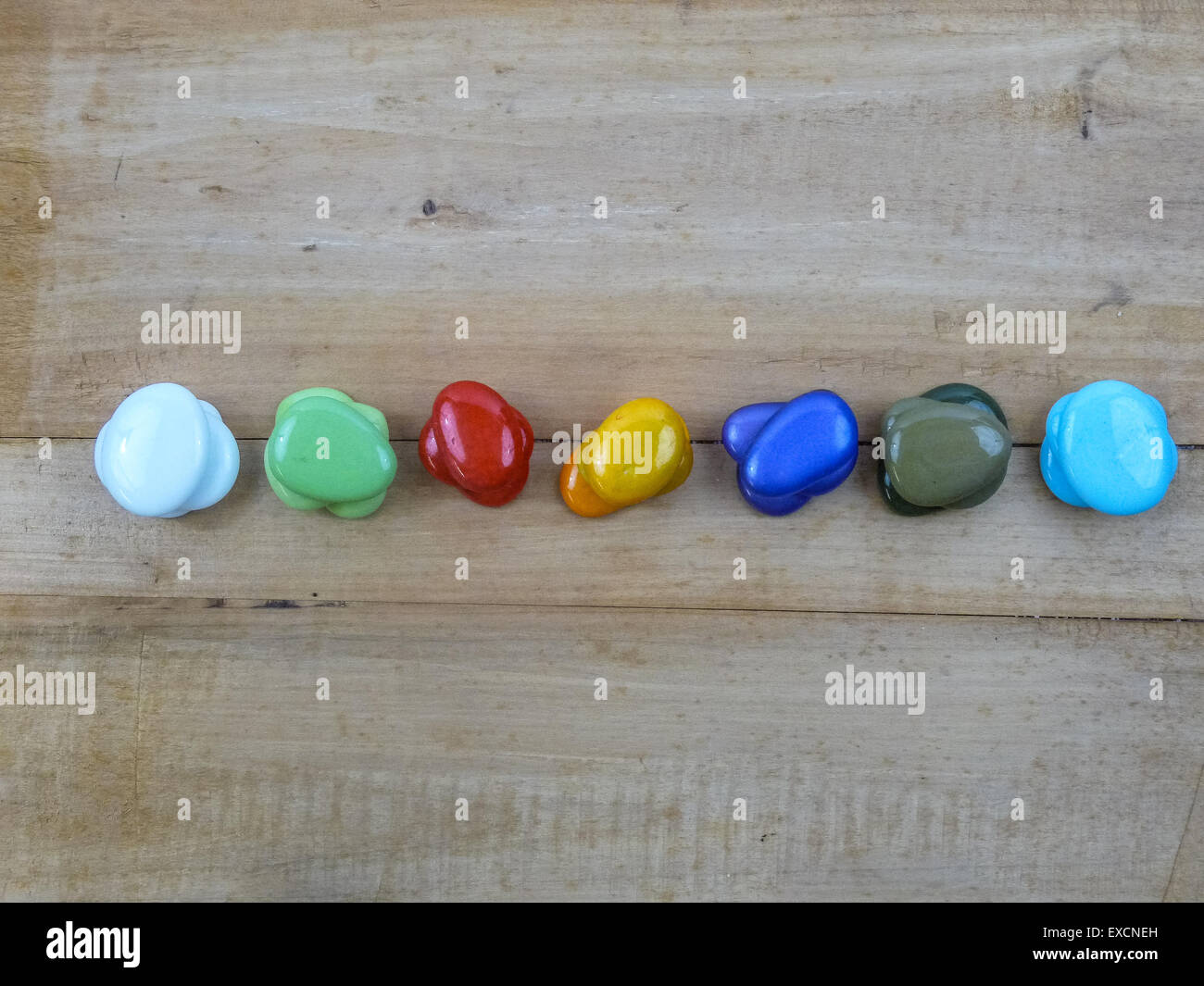 A different color pebble assortment Stock Photo - Alamy