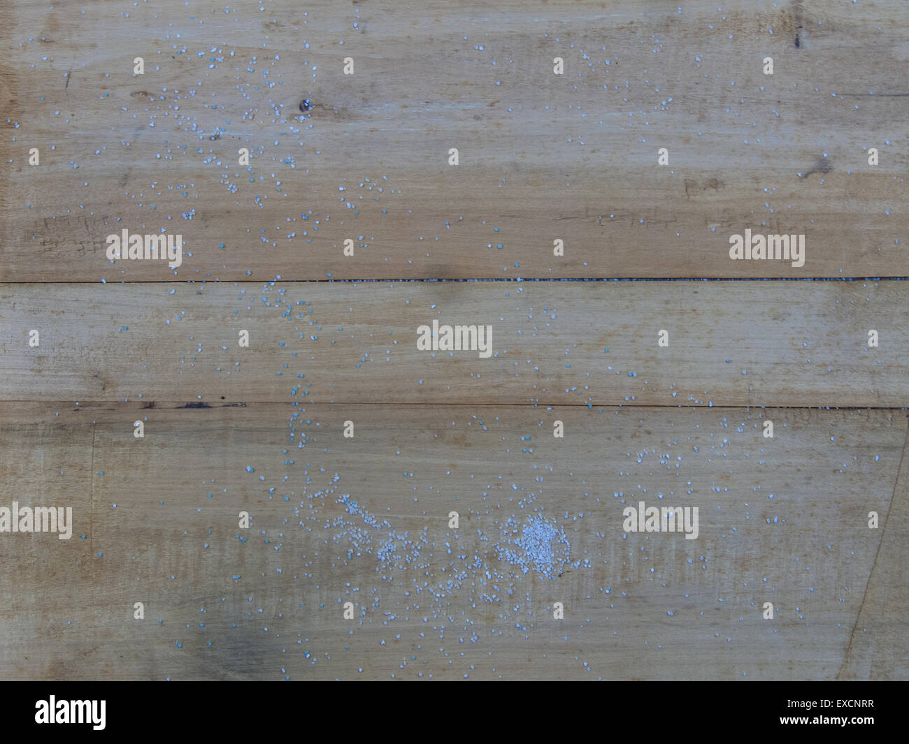 A wooden board sprinkled with sand Stock Photo - Alamy