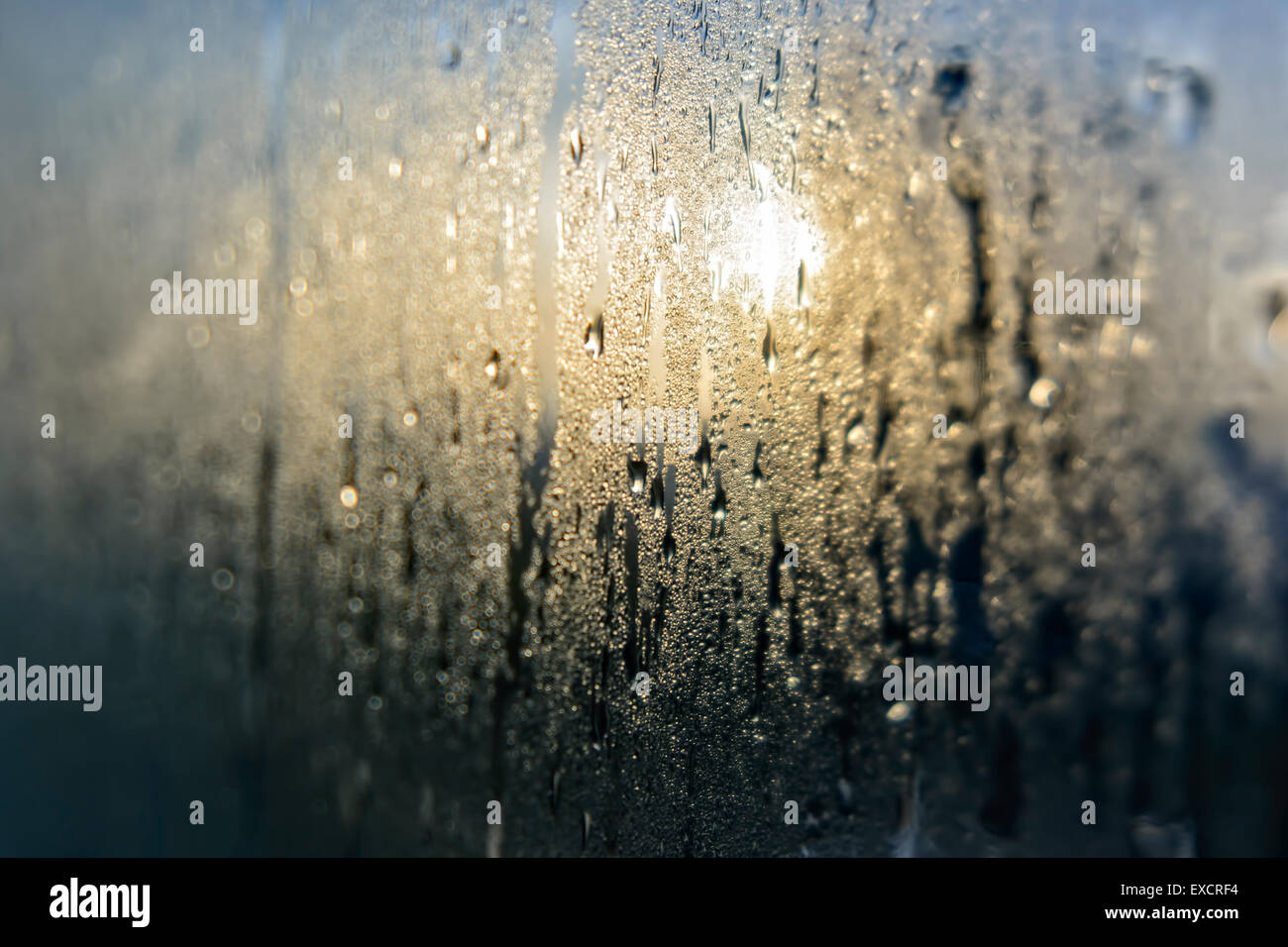 Mist and raindrops on glass pane after a night of rain Stock Photo - Alamy