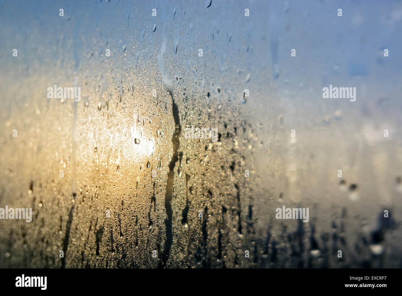 Mist and raindrops on glass pane after a night of rain Stock Photo - Alamy