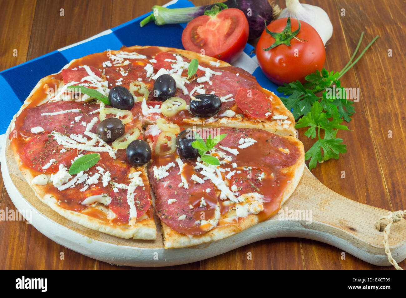 Pepperoni pizza wooden table hi-res stock photography and images - Alamy