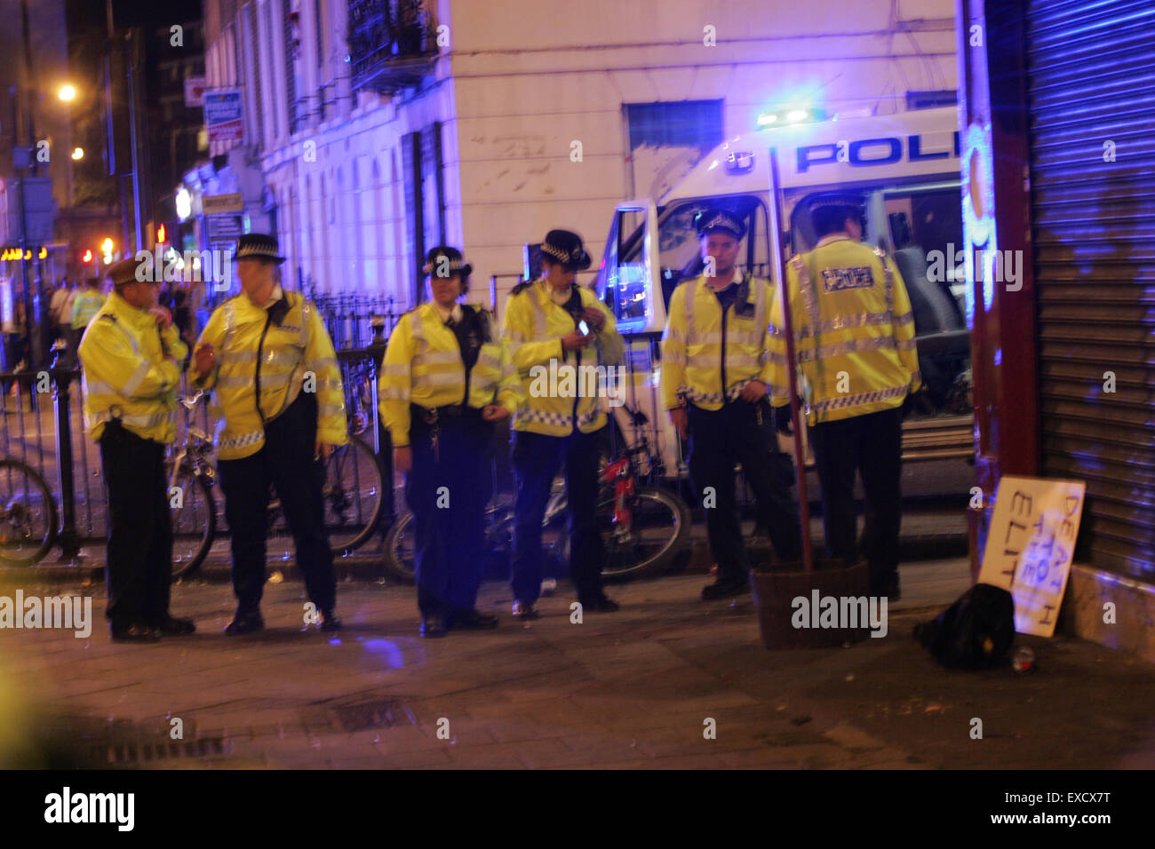 London, UK. 11th July, 2015. Police reinforcements arrive at a ...