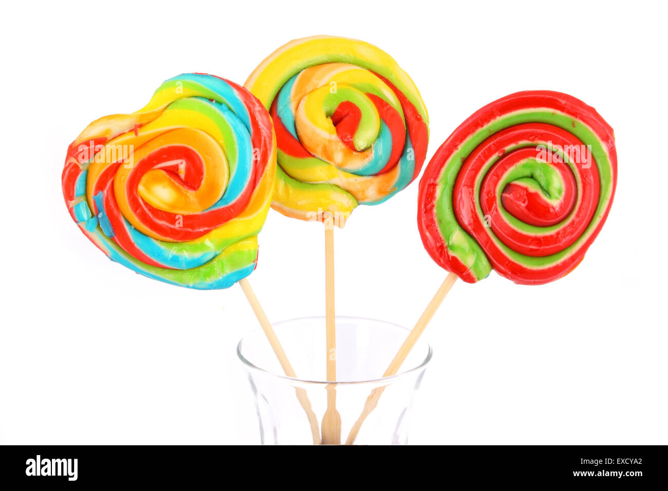 Three colorful candies isolated on white background Stock Photo - Alamy