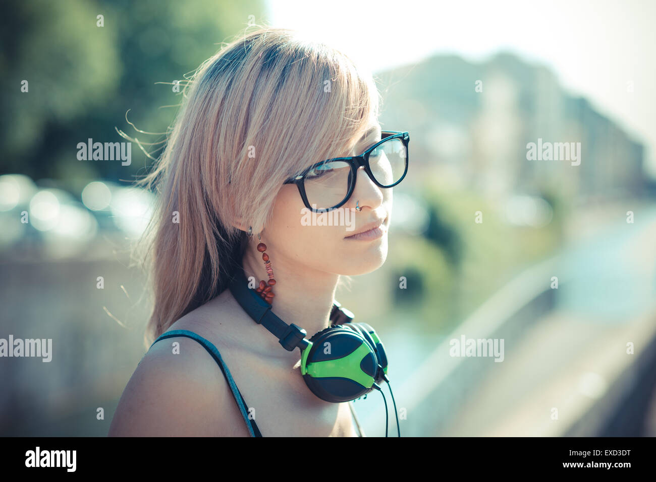 young beautiful model woman listening music in the city Stock Photo - Alamy