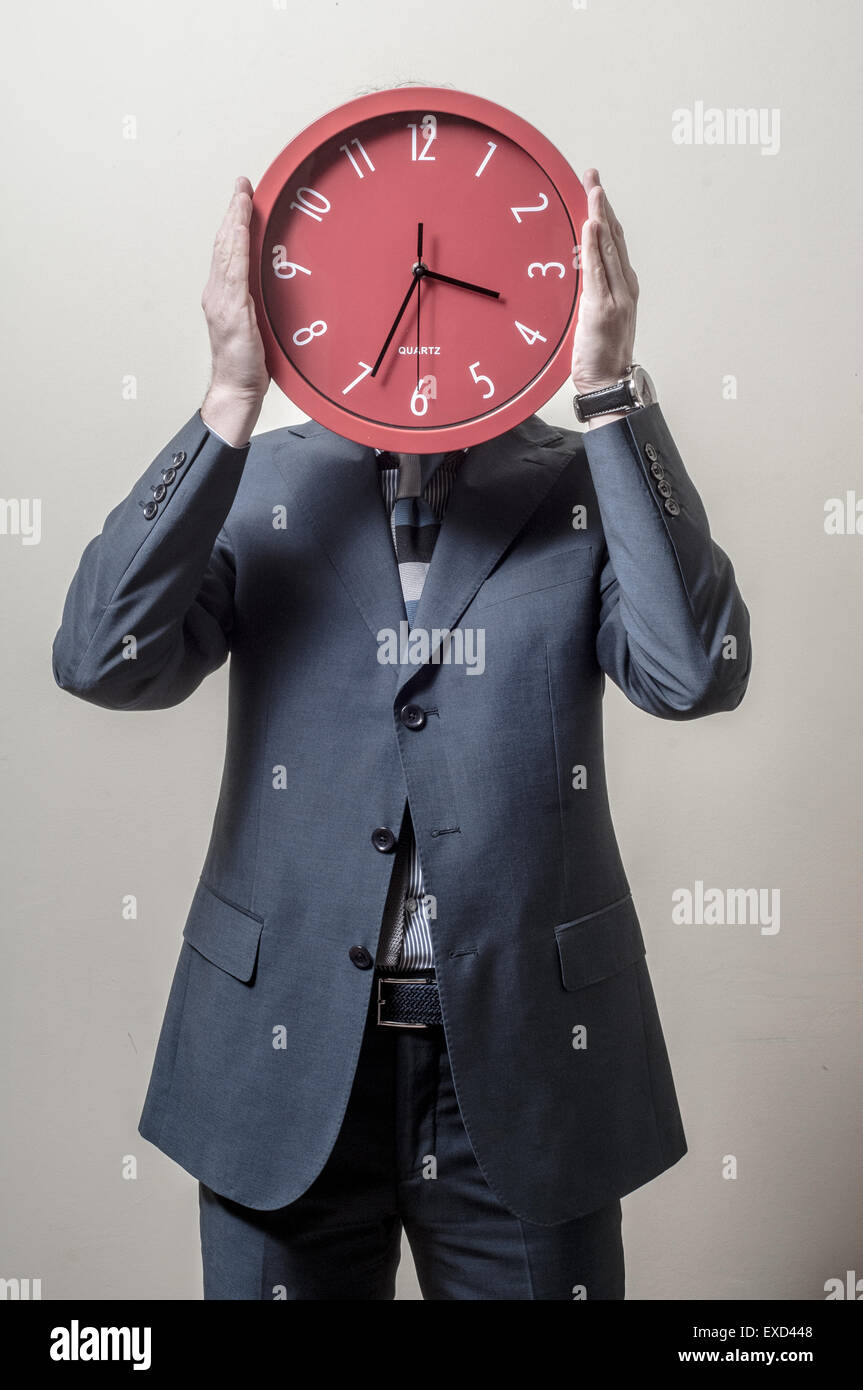 Clock on head hi-res stock photography and images - Alamy