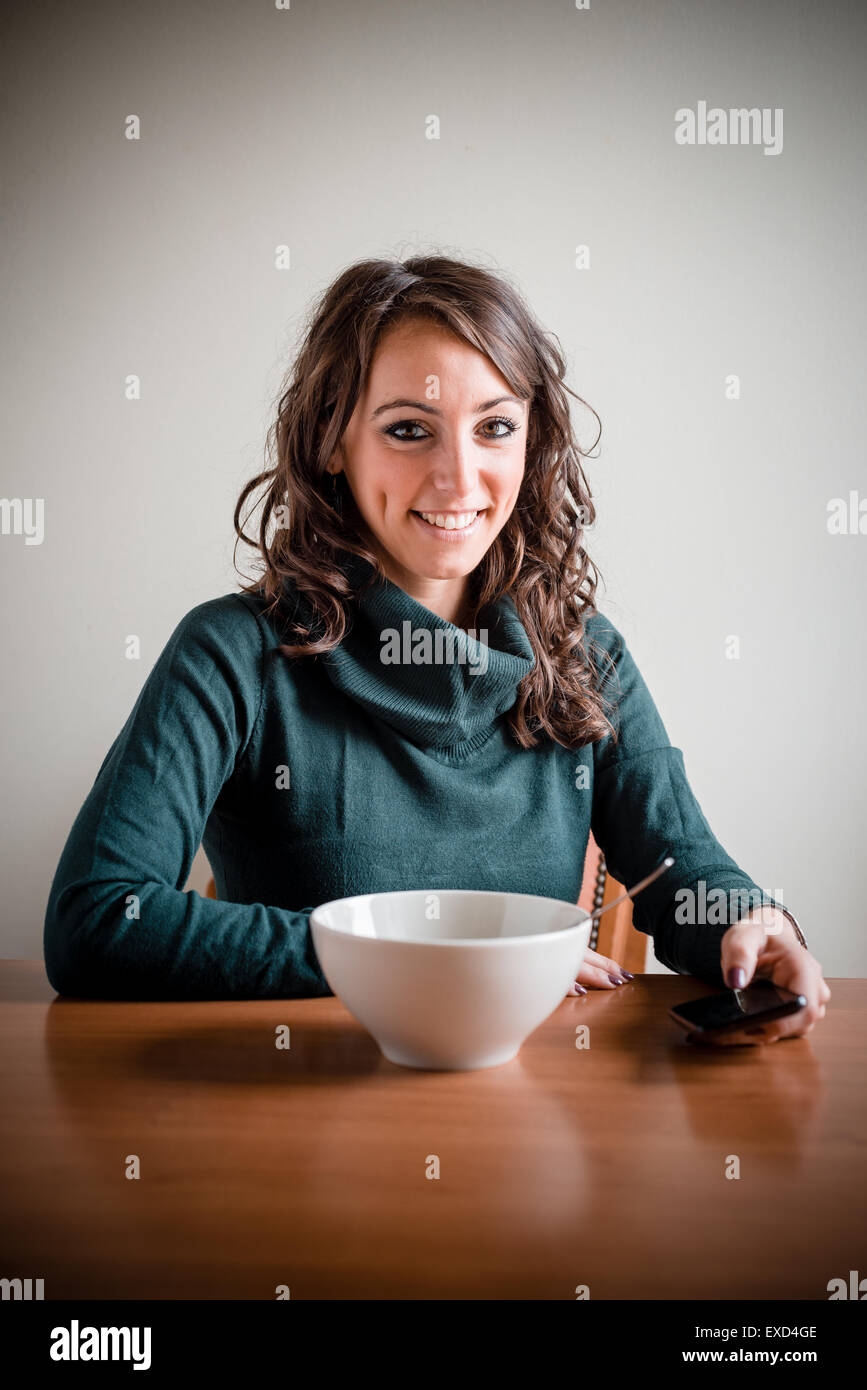 beautiful woman having breakfast at home Stock Photo - Alamy