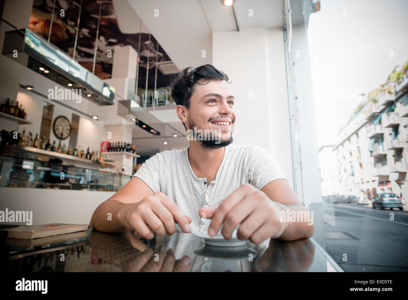young stylish man at the bar with coffee Stock Photo - Alamy