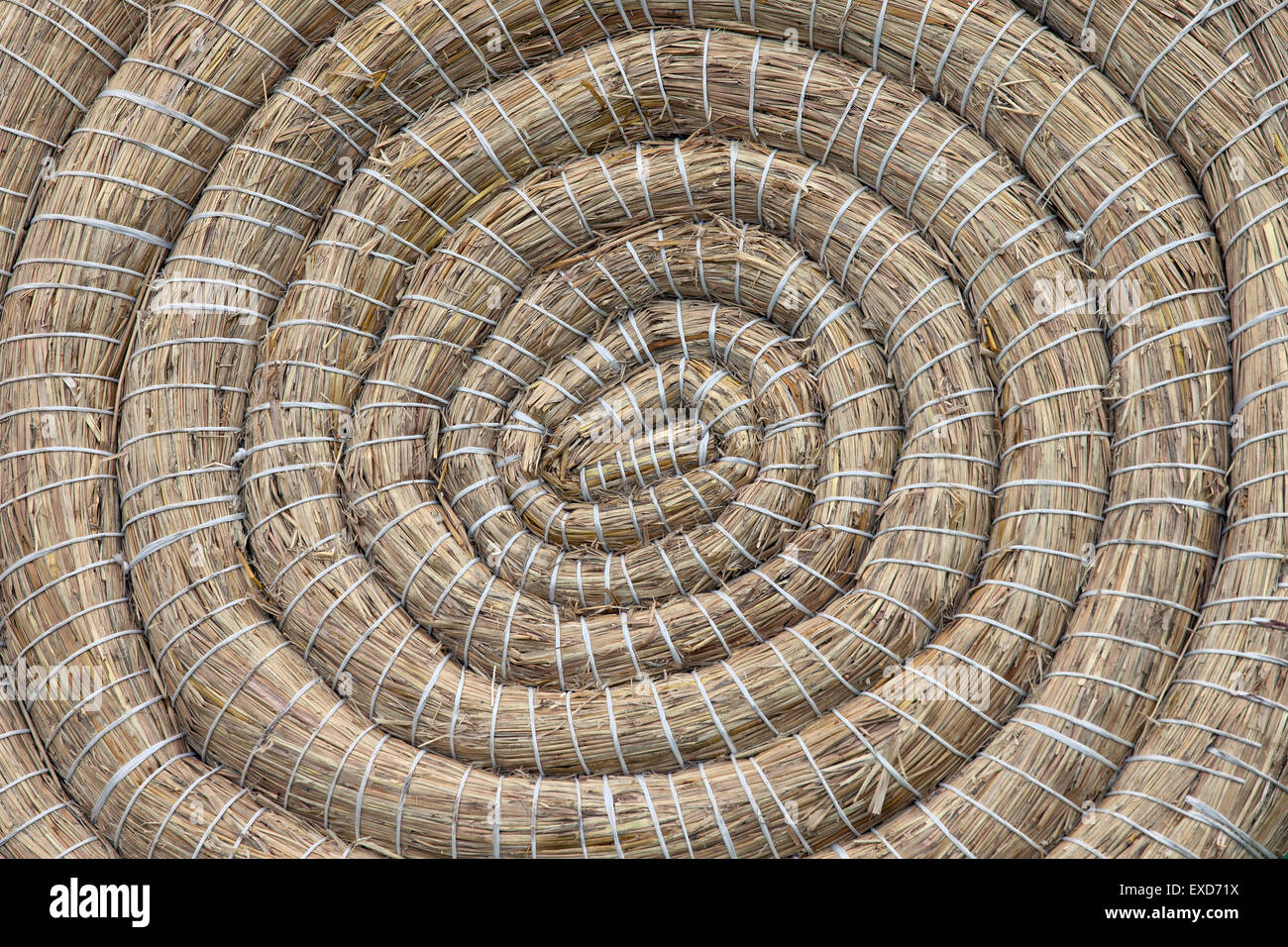 Closeup for background on traditional archery round coiled straw target ...