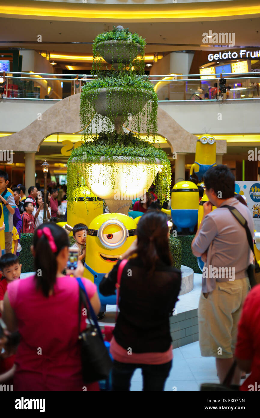 Children posing for photo with characters of the movie "Minions" at Mid ...