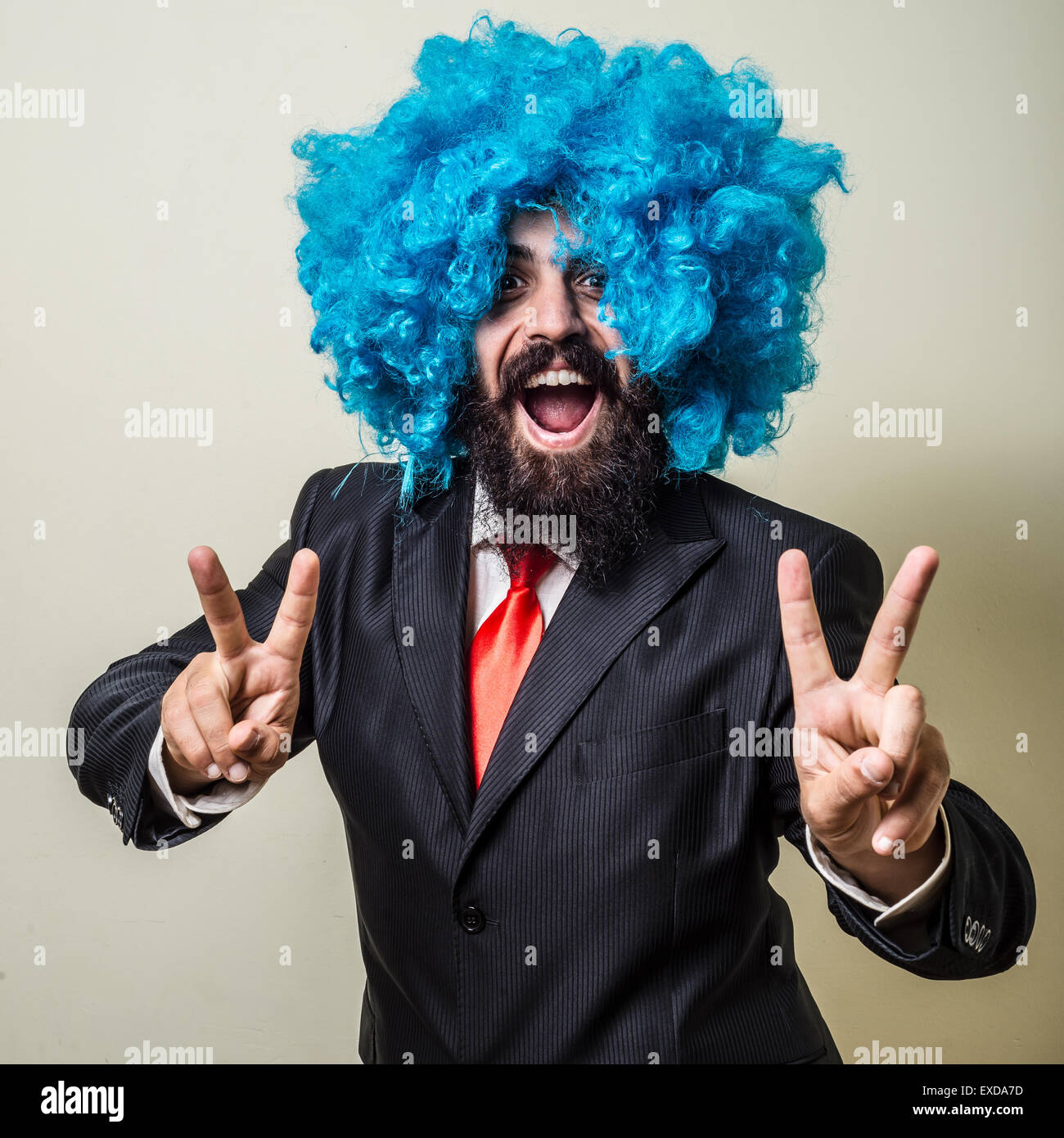 crazy funny bearded man with blue wig on white background Stock Photo ...