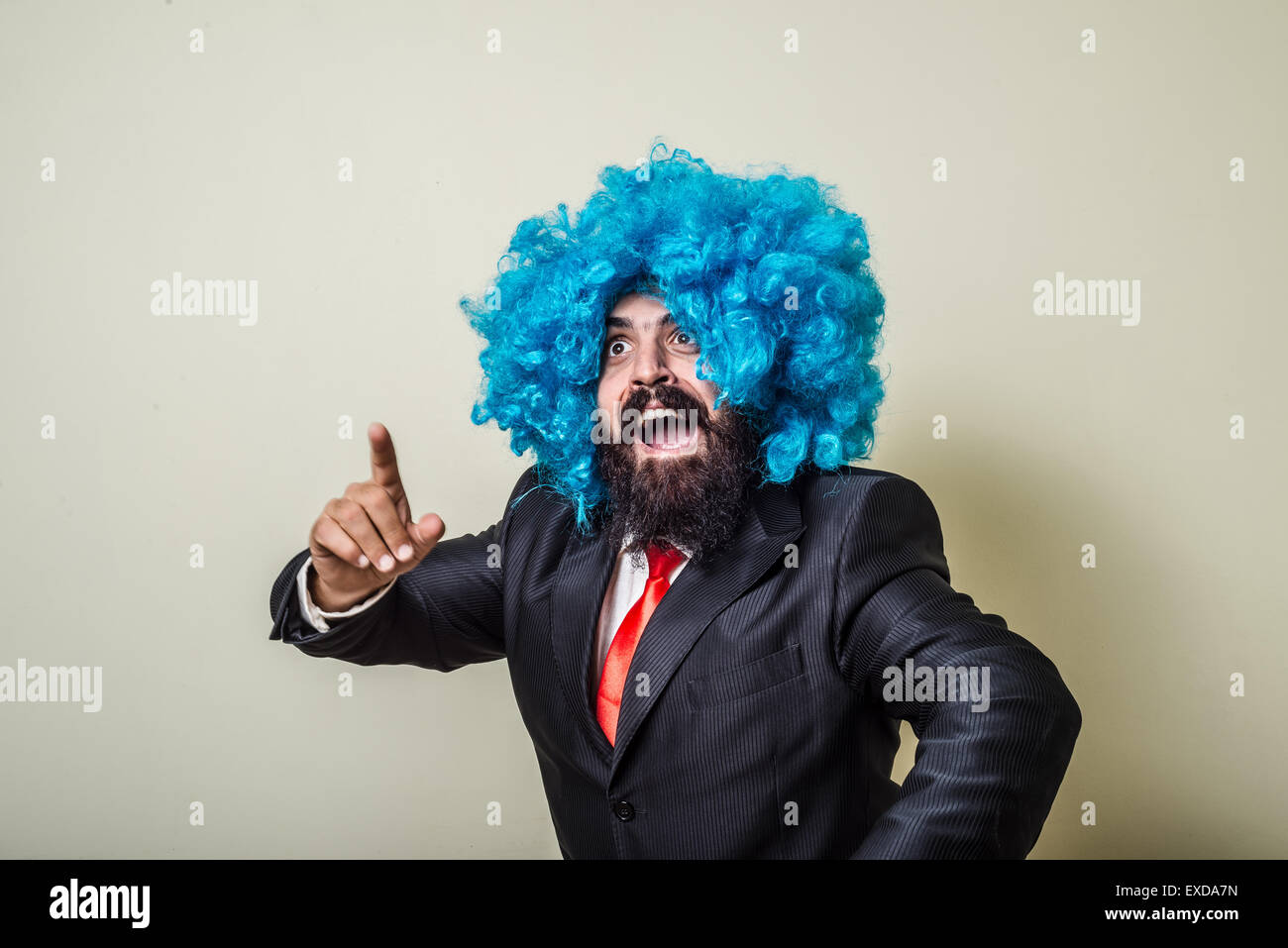 crazy funny bearded man with blue wig on white background Stock Photo ...