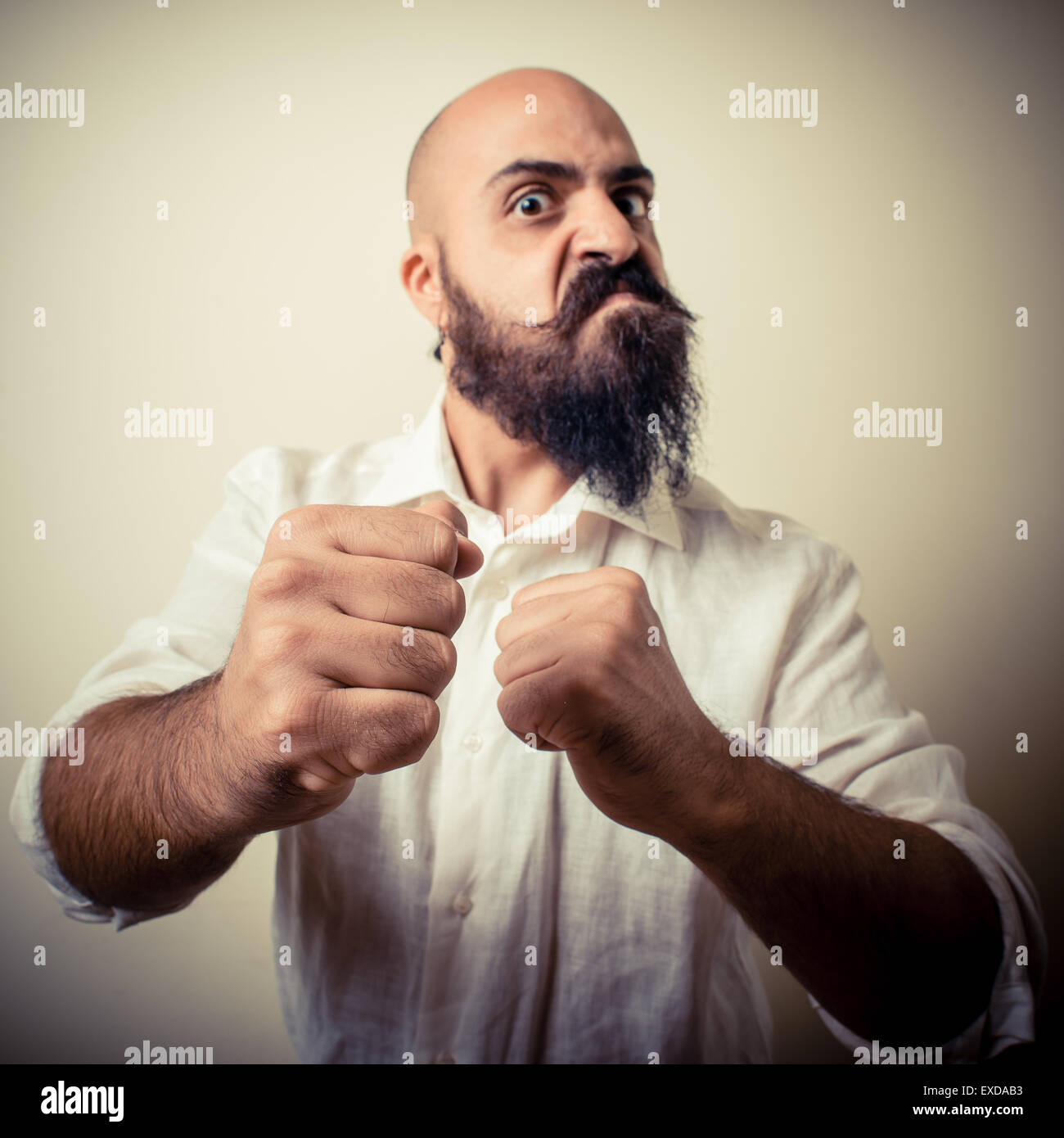 Angry man and long white beard hi-res stock photography and images - Alamy