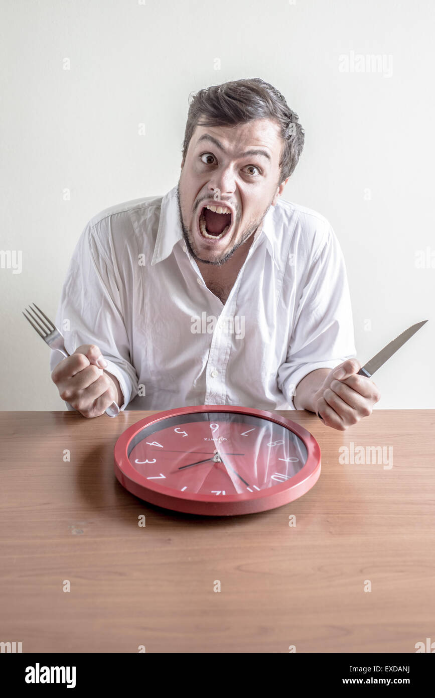 Eating the clock hi-res stock photography and images - Alamy