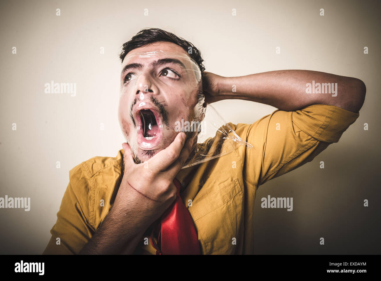 suffocating man with the plastic on white background Stock Photo - Alamy