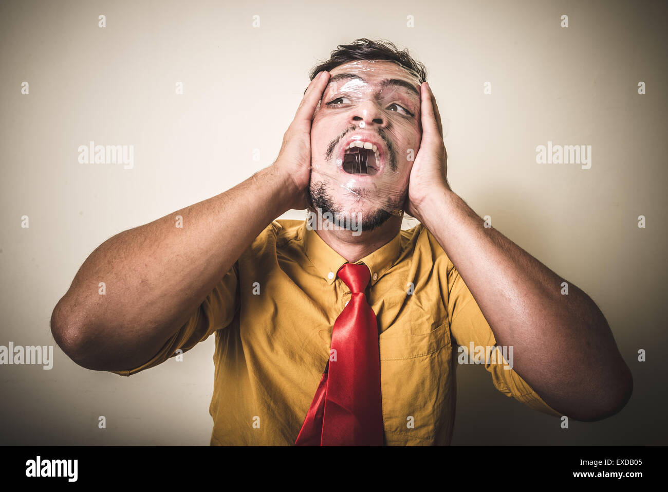 suffocating man with the plastic on white background Stock Photo - Alamy