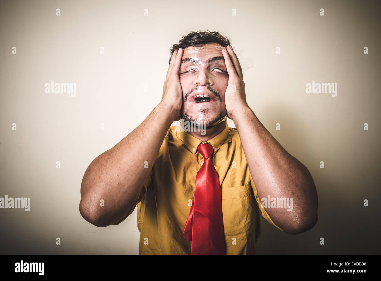 suffocating man with the plastic on white background Stock Photo - Alamy