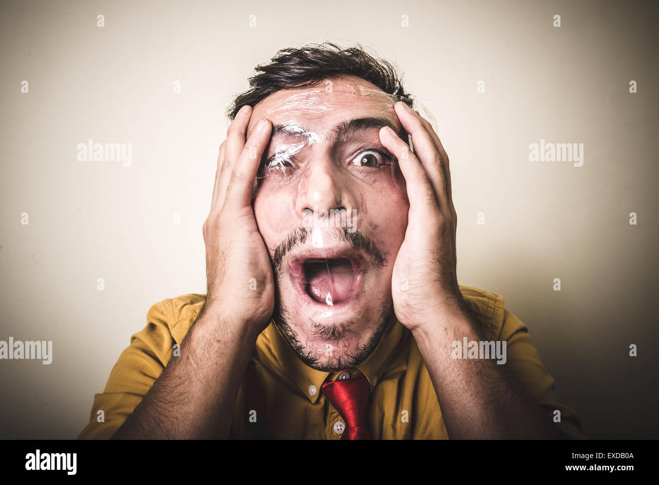 suffocating man with the plastic on white background Stock Photo - Alamy