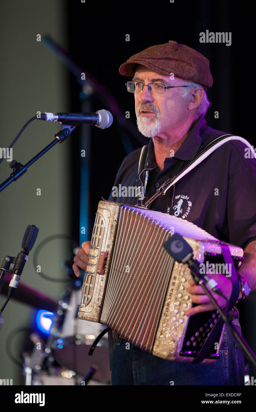 Great Tew, Oxford, UK. 12th July 2015. The Fishwives' Choir performs on ...