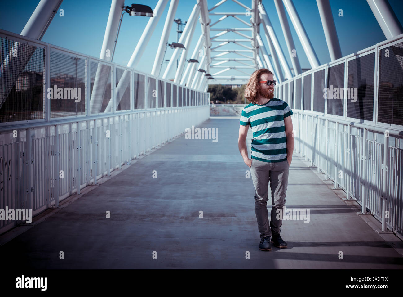 stylish hipster model with long red hair and beard lifestyle in the ...