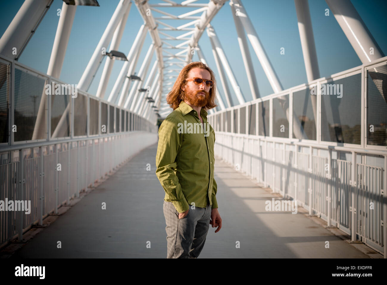 stylish hipster model with long red hair and beard lifestyle in the ...