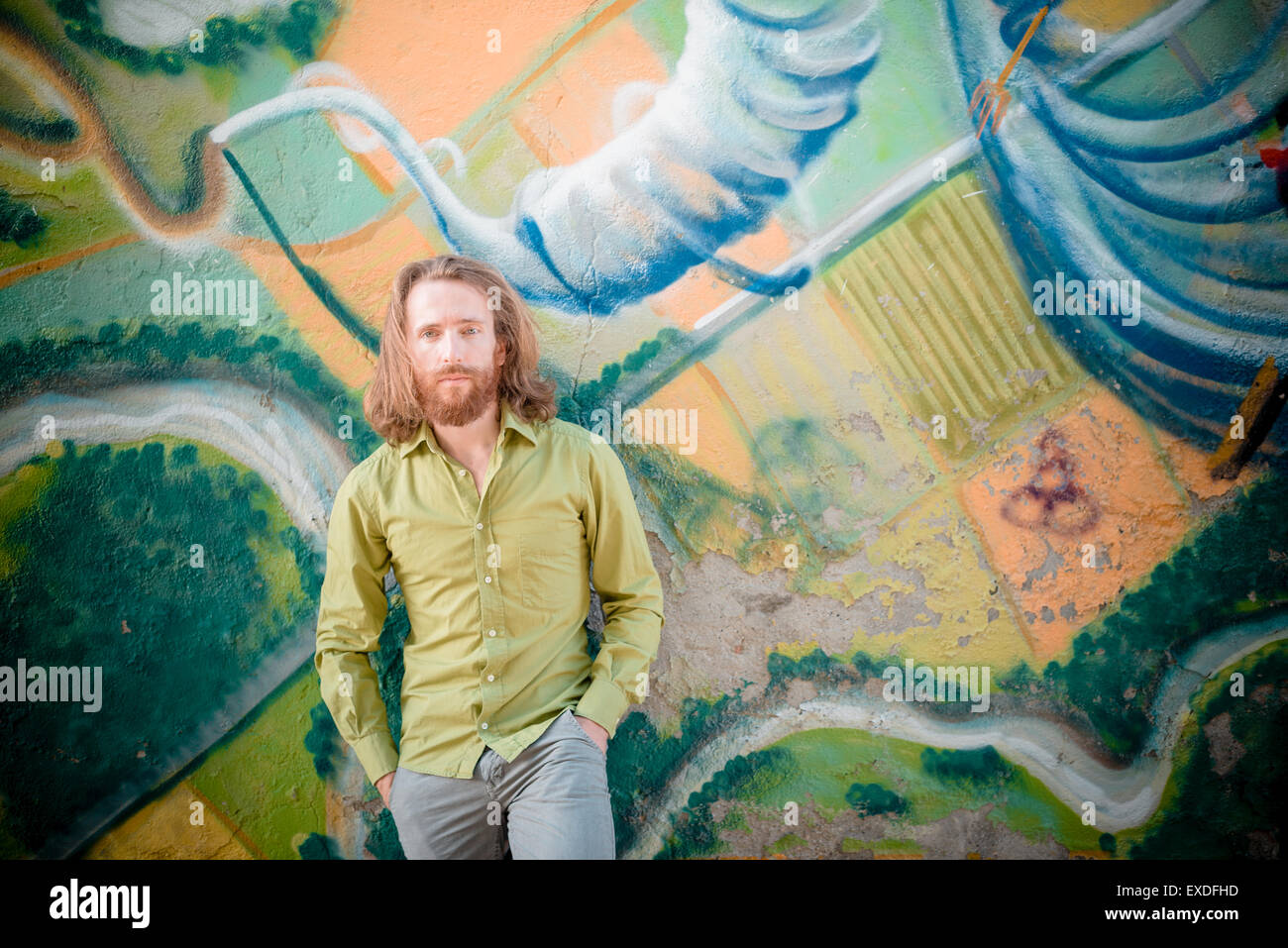stylish hipster model with long red hair and beard lifestyle in the ...