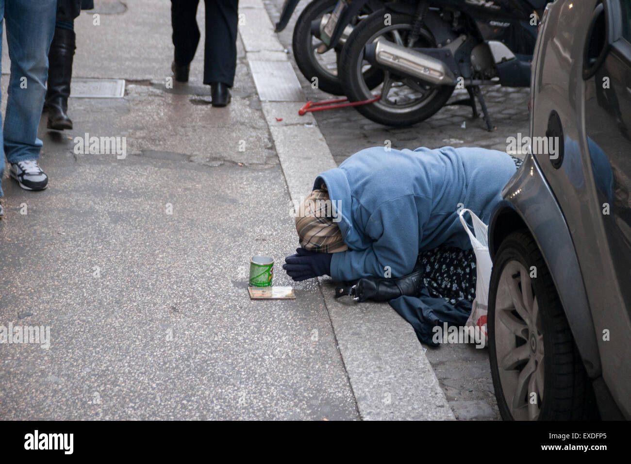 Female beggar hi-res stock photography and images - Alamy