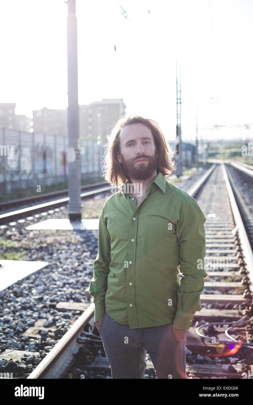 stylish hipster model with long red hair and beard lifestyle in the ...