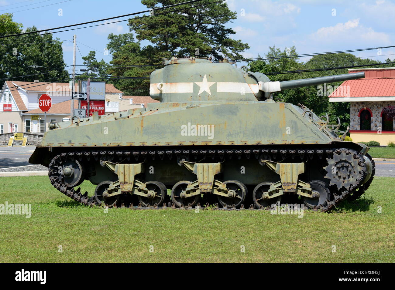 Militery tank on display for the public to see. A sign of the countries ...