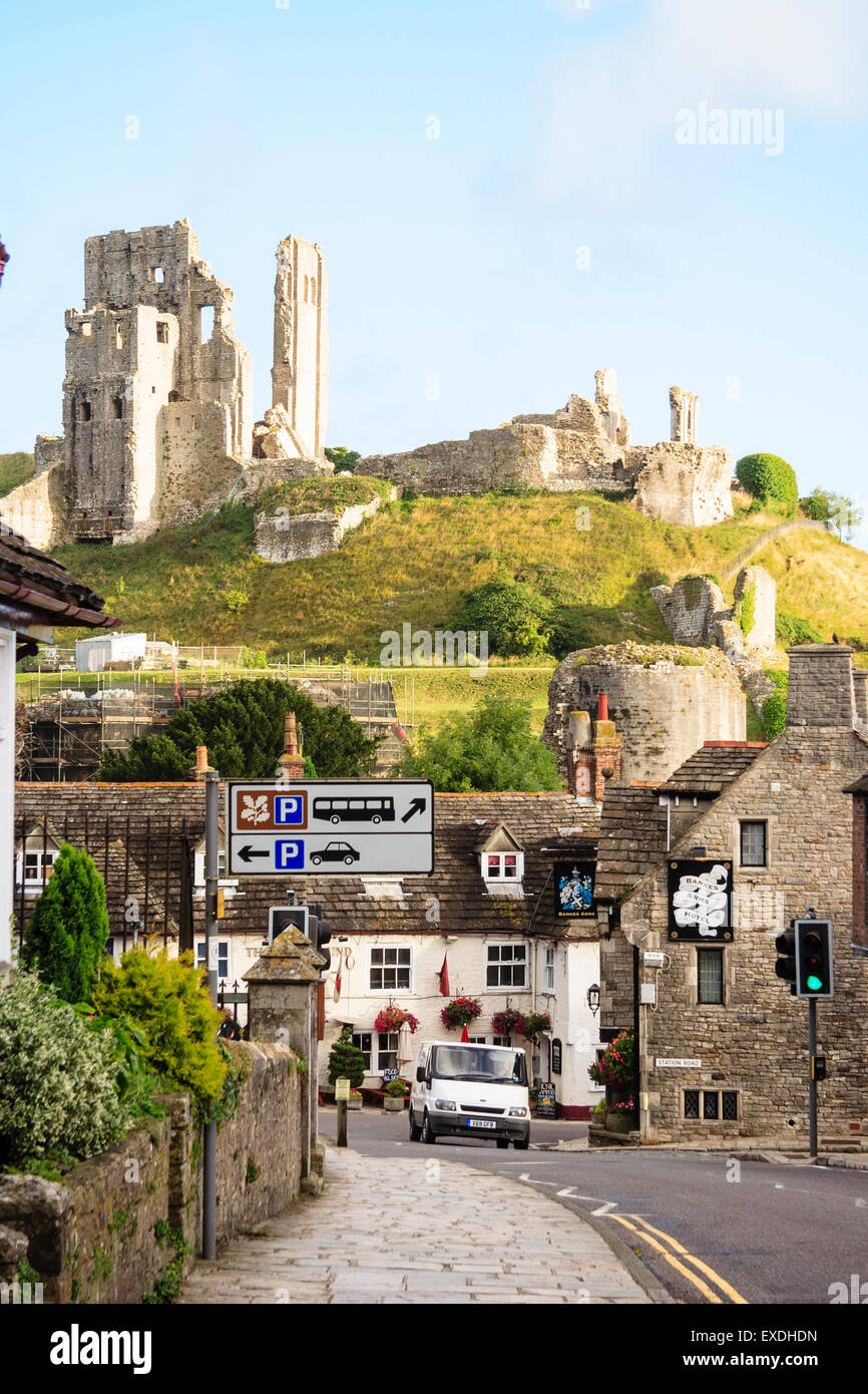 The ruins of the 11th century Corfe Castle towering over the the Dorest ...