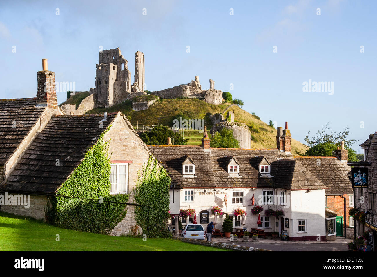 The ruins of the 11th century Corfe Castle towering over the the Dorest ...