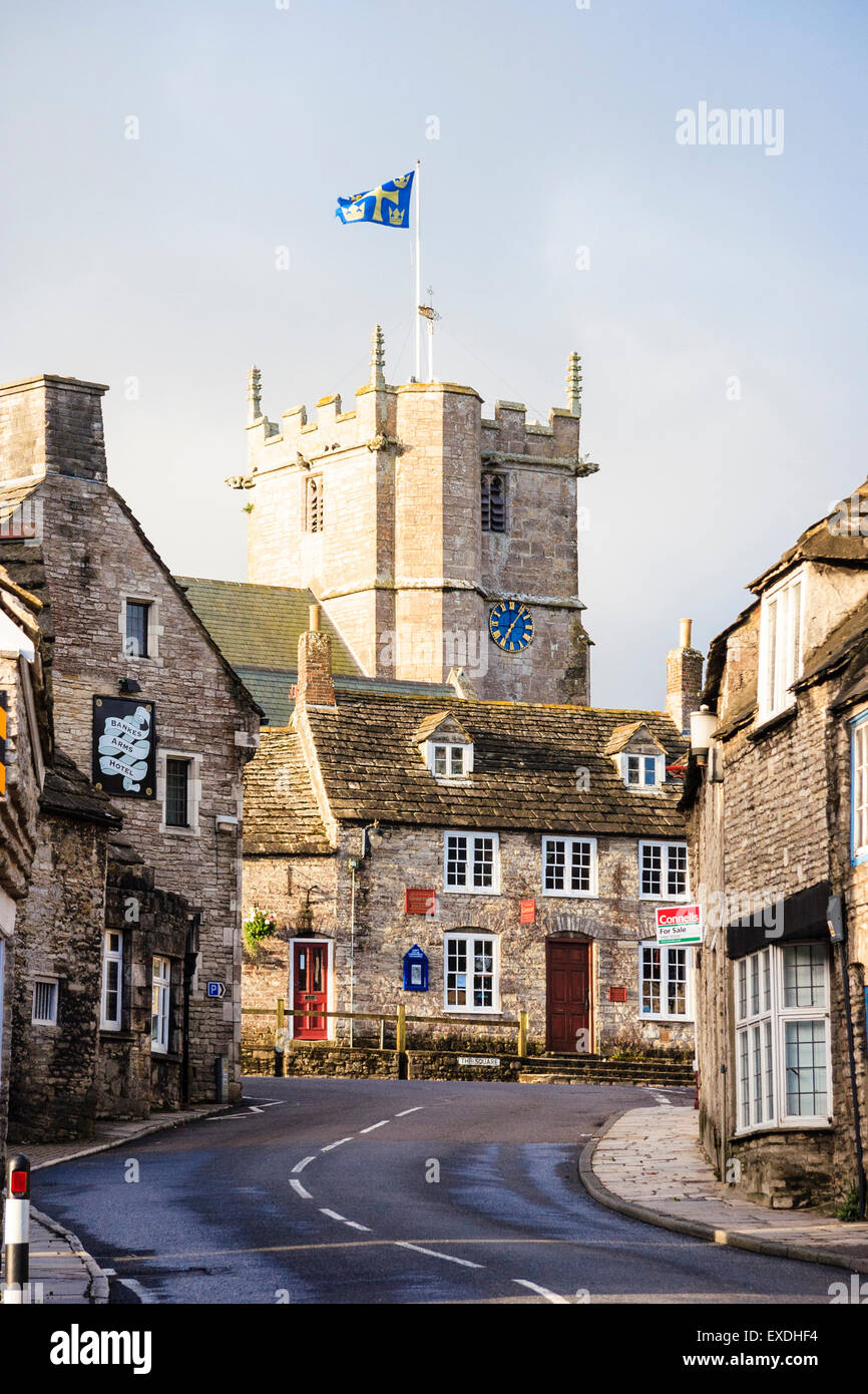 Corfe village with buildings made of grey Purbeck limestone. The tower ...