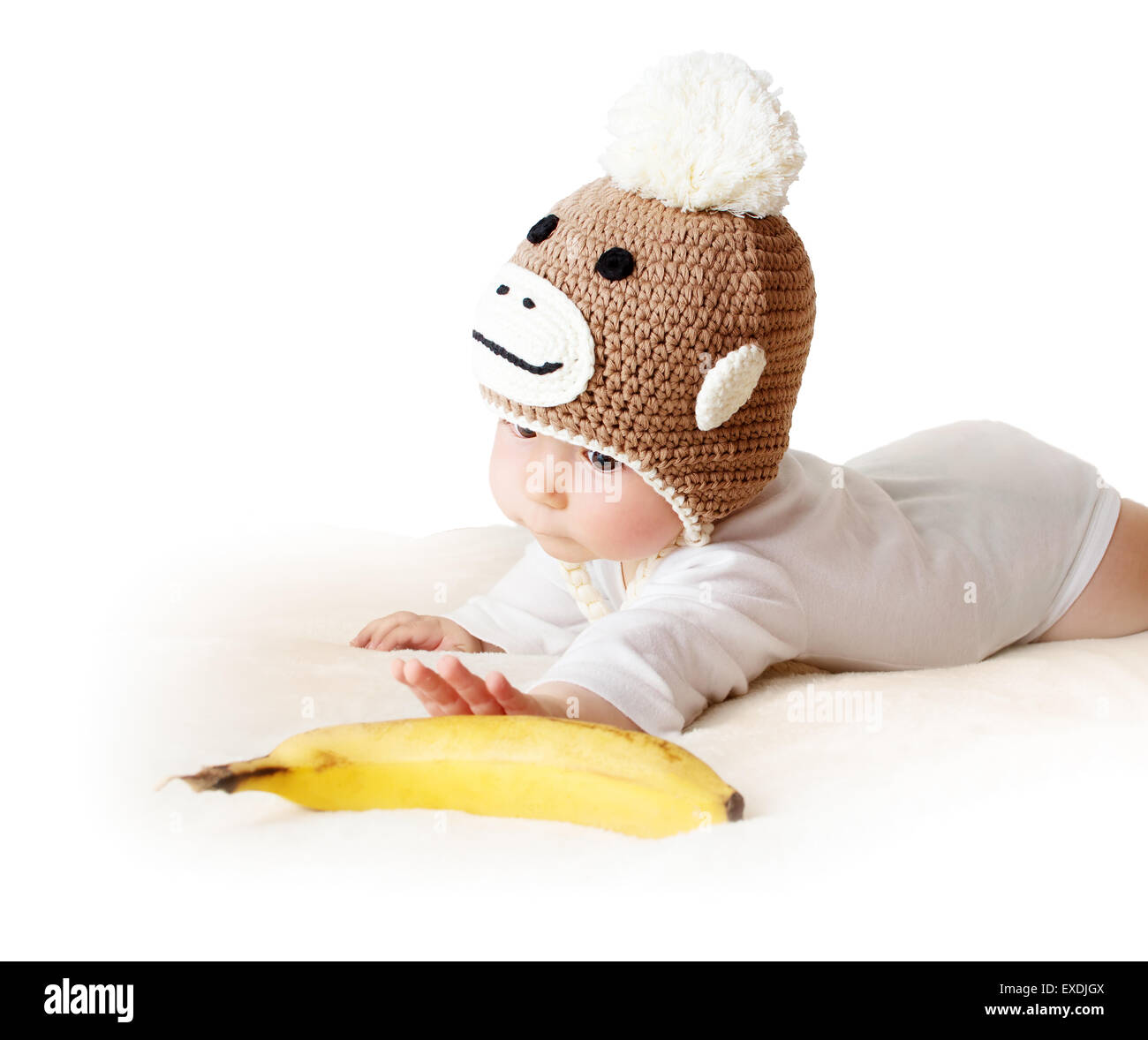 Baby in monkey hat Stock Photo - Alamy