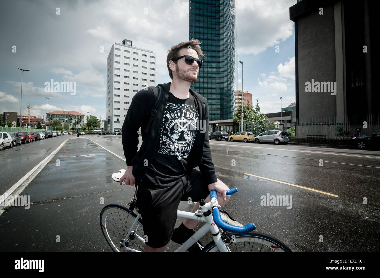 stylish man on bike in the city Stock Photo - Alamy