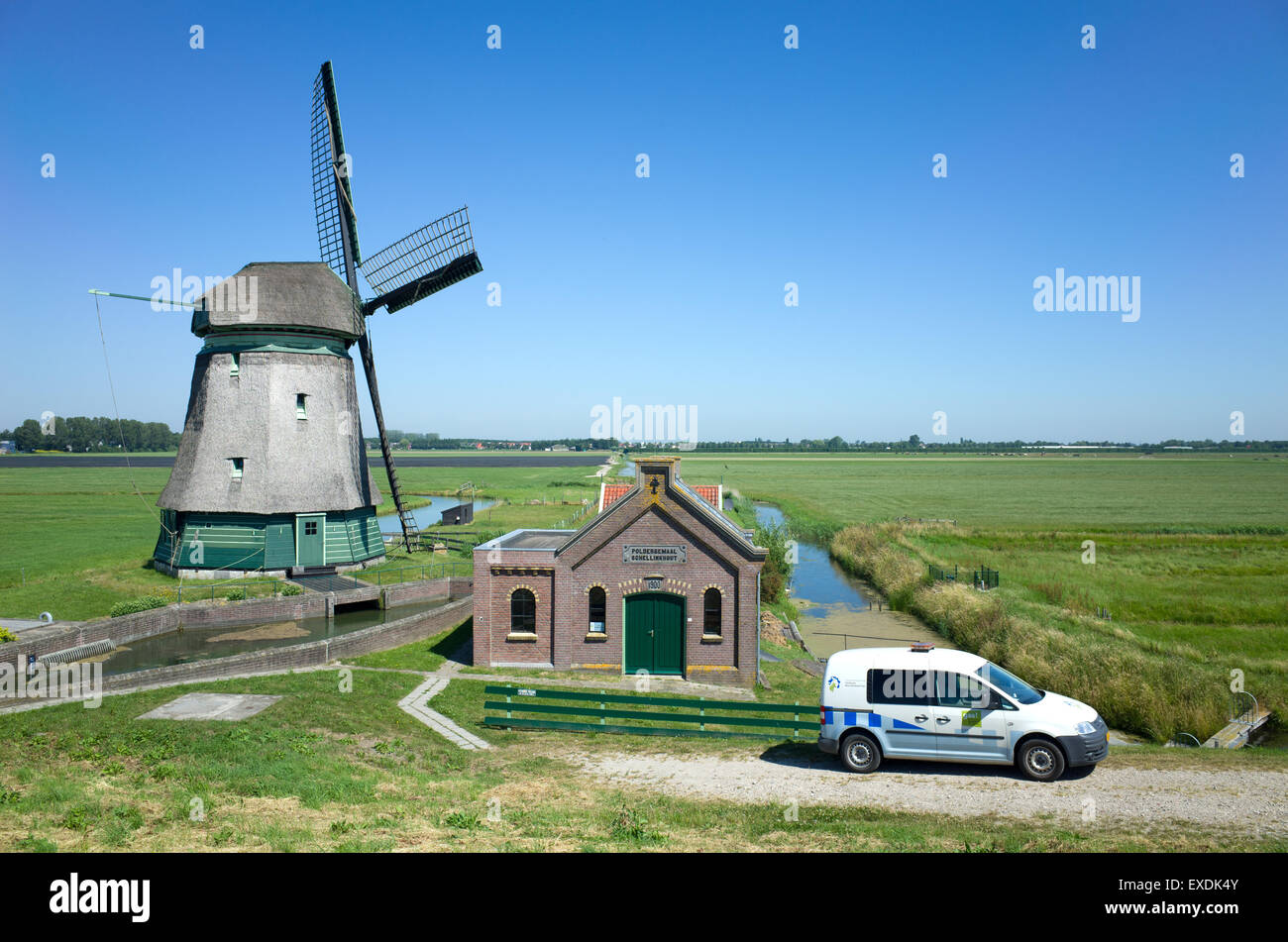 A typical Dutch Flour Windmill Holland Netherlands, with a white van ...