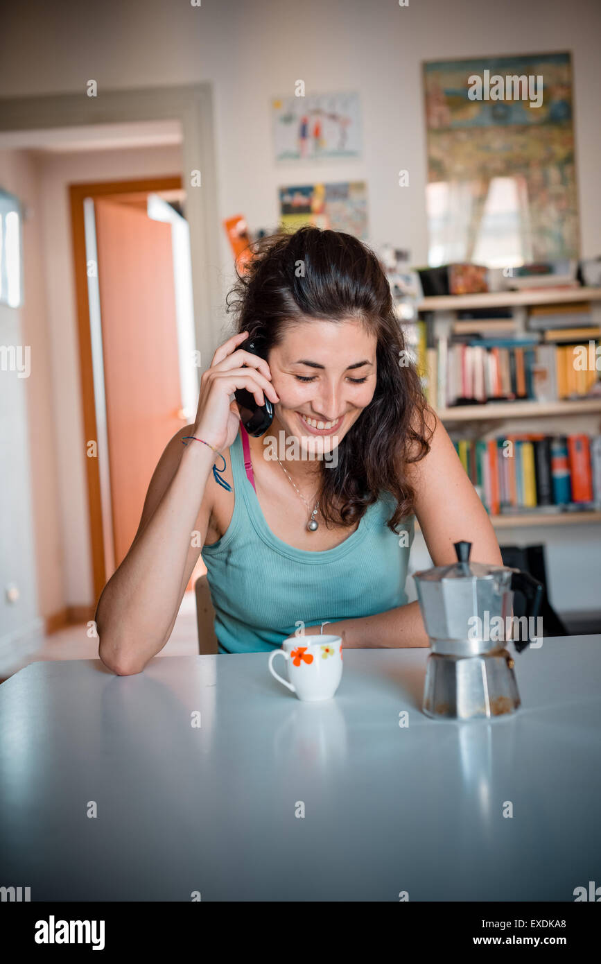 beautiful woman calling during breakfast at home Stock Photo - Alamy