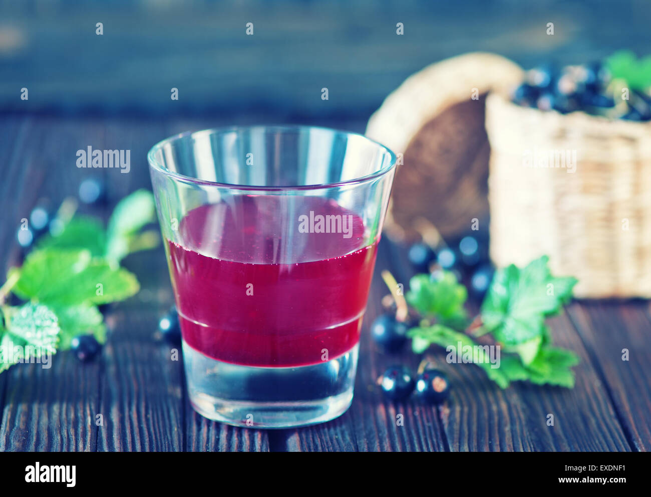 black currant juice in glass and on a table Stock Photo - Alamy