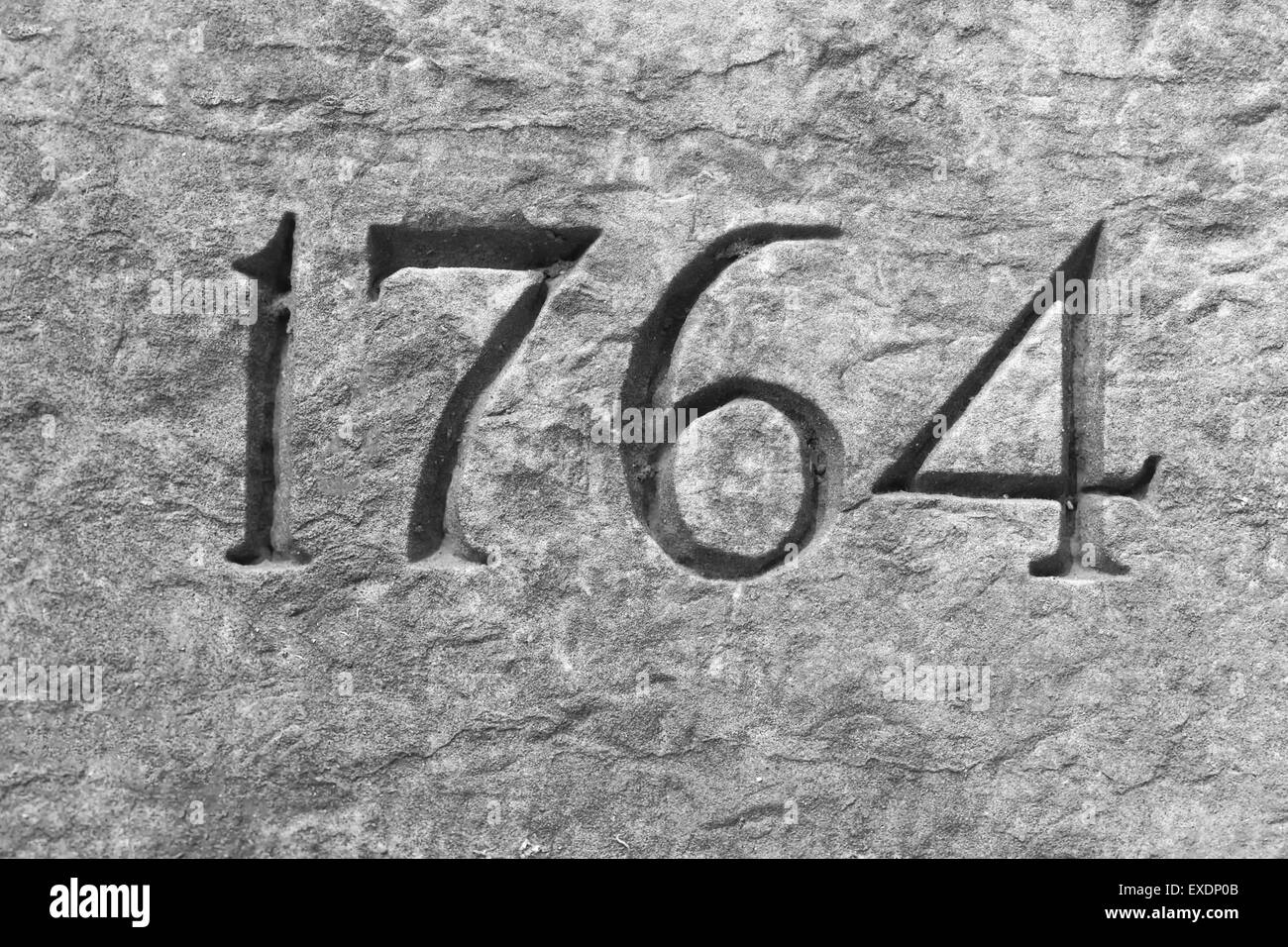 Granite wall with the year 1764 etched in stone Stock Photo - Alamy