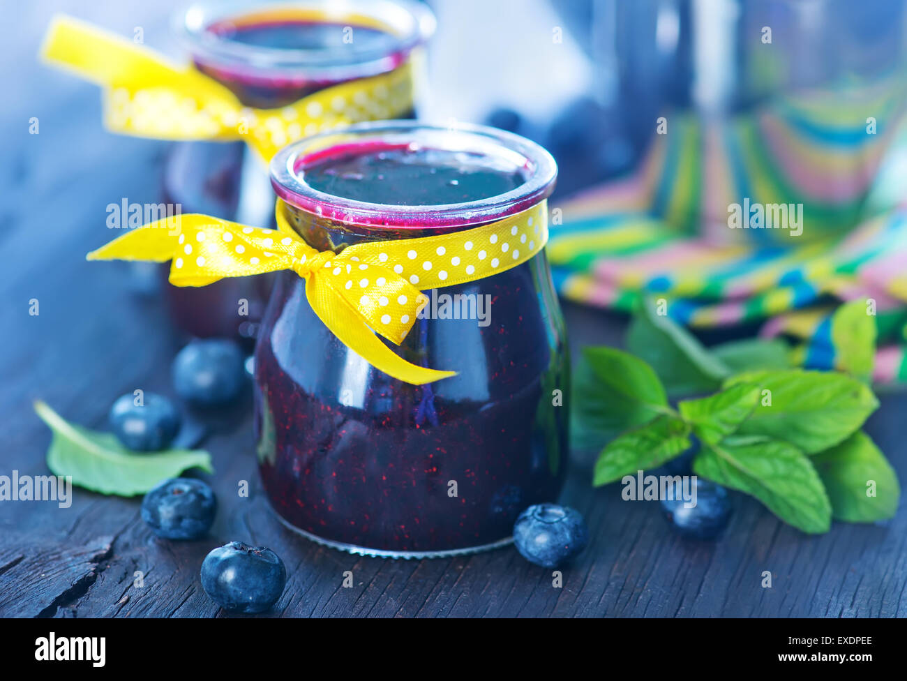 blueberry jam in glass bank and on a table Stock Photo - Alamy