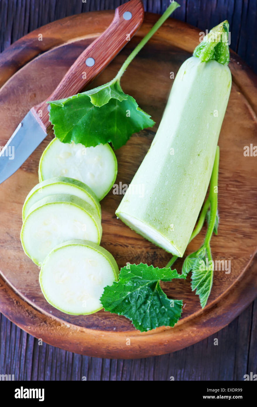 fresh marrow on the wooden background Stock Photo - Alamy