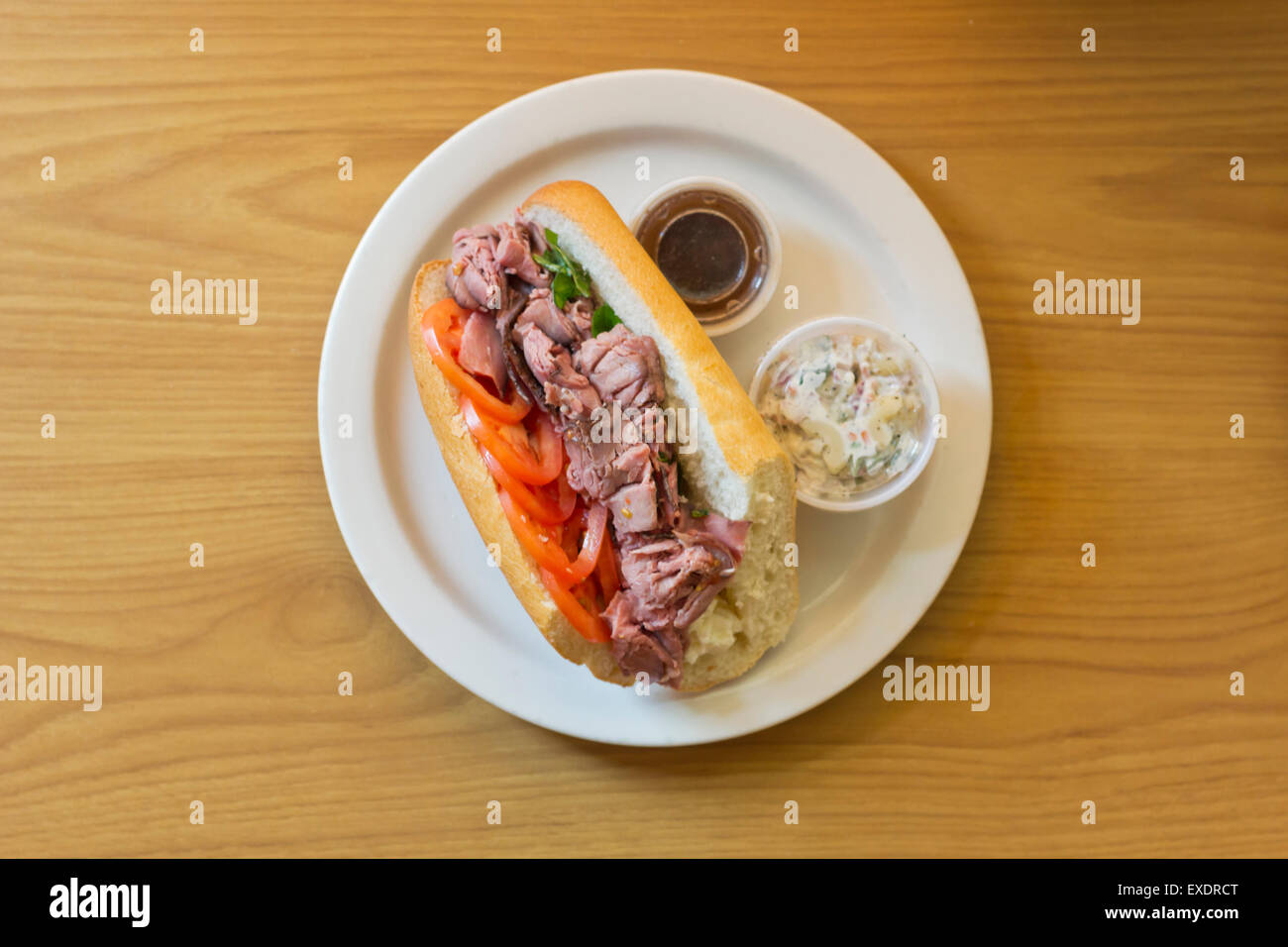 Roast beef on torpedo roll with tomato basil and fresh mozzarella ...