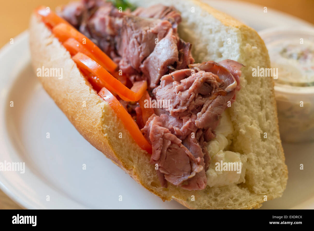 Roast beef on torpedo roll with tomato basil and fresh mozzarella ...